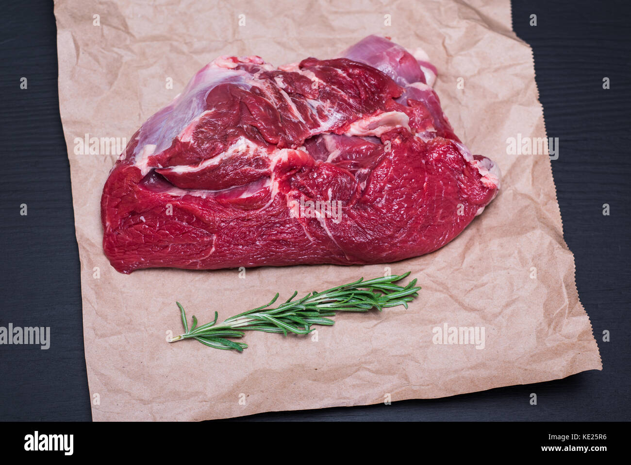 Fresh raw beef fillet on brown kraft paper, top view Stock Photo - Alamy