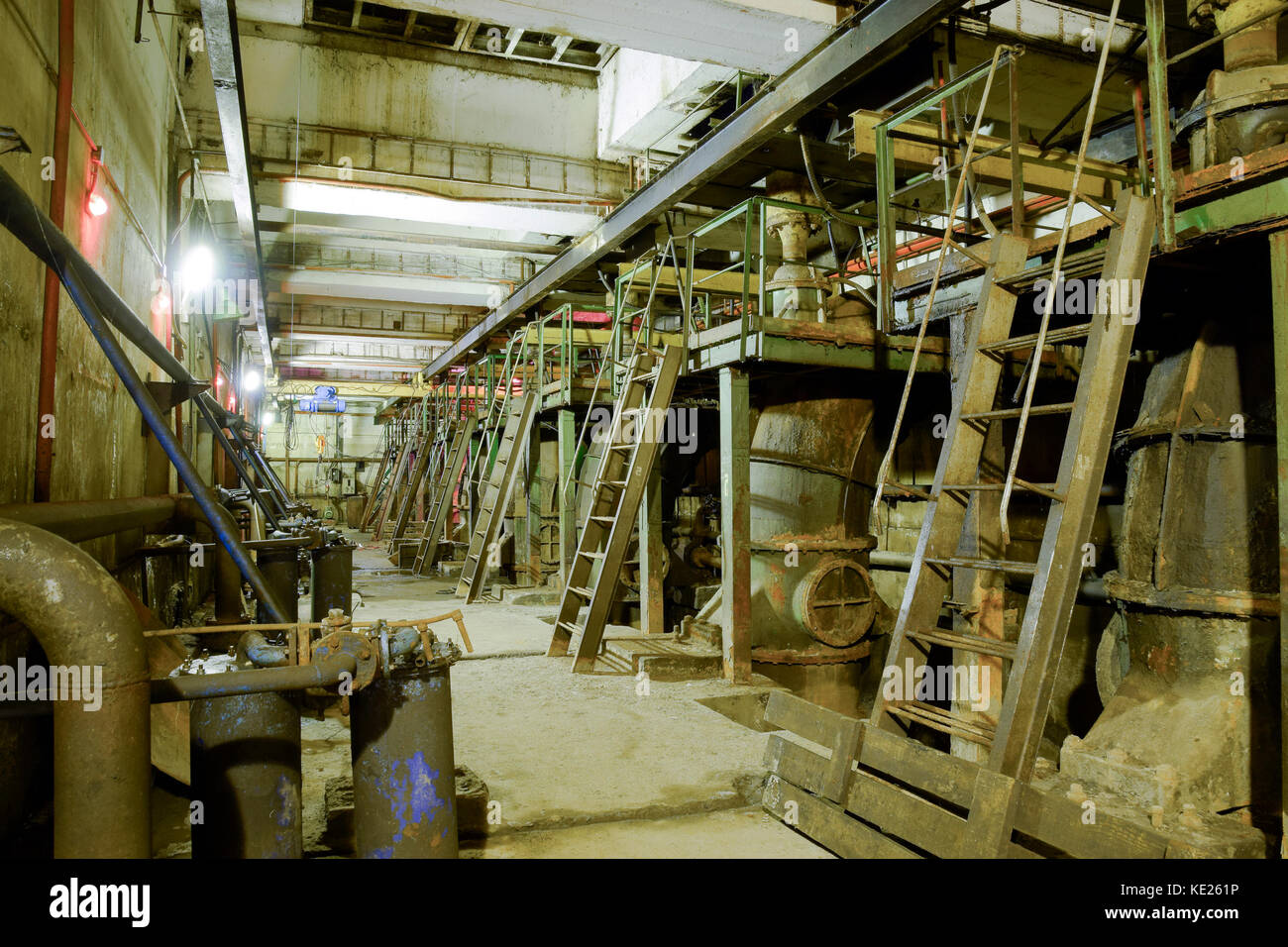 Basement of a water pumping station. Abandoned post-apocalyptic view of ...