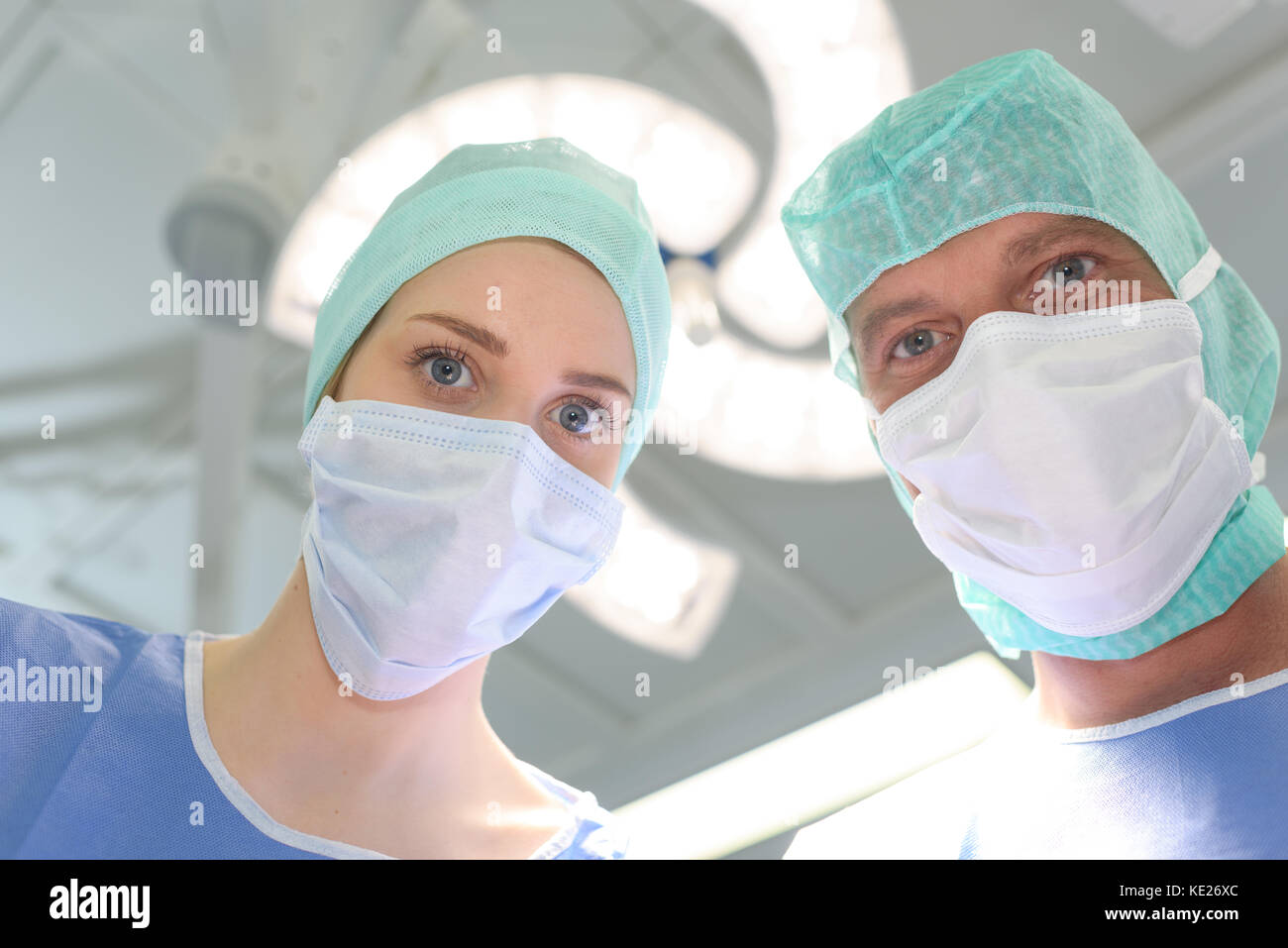 surgeon looking over Stock Photo - Alamy