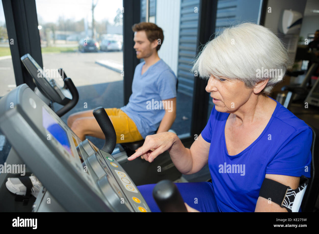 beautiful fit senior woman in gym doing cardio work out Stock Photo - Alamy