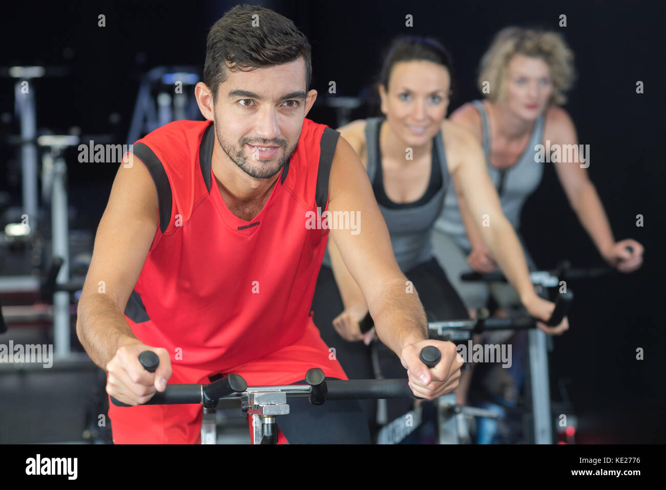 sporty people on spinning class Stock Photo - Alamy