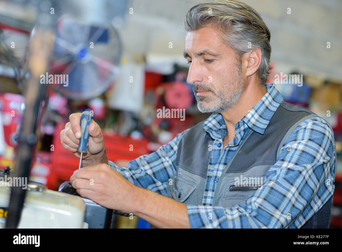small engine mechanic Stock Photo - Alamy