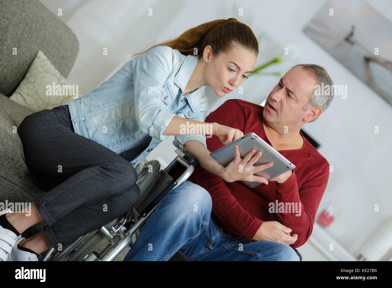 Helping handicapped hi-res stock photography and images - Alamy