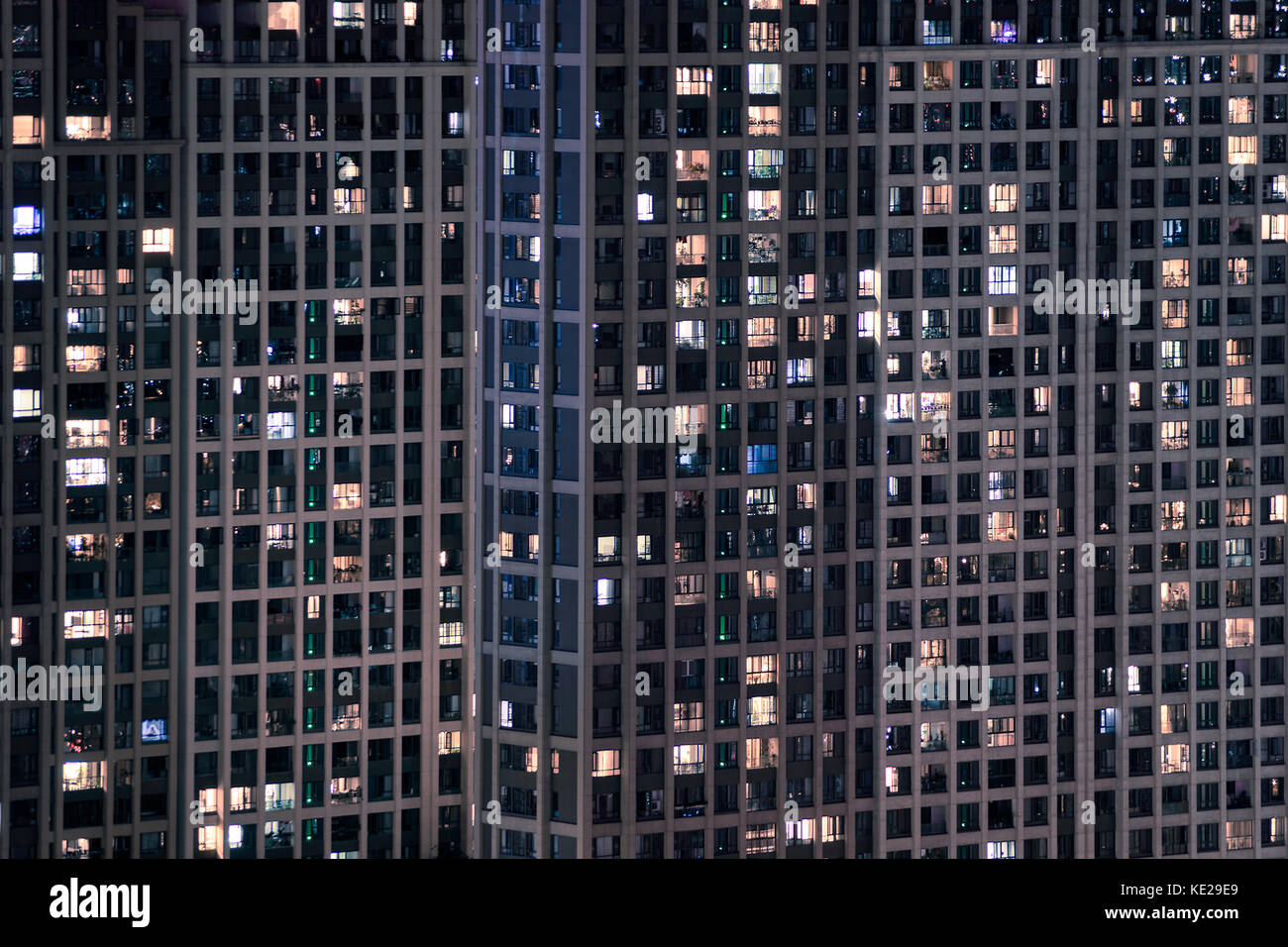 Glowing apartment windows at night Stock Photo - Alamy
