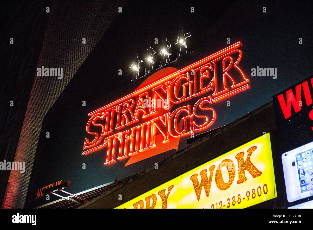Neon advertisement for Stranger Things above retail units on Delancey ...