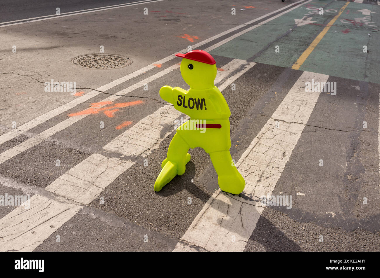 'Slow' traffic sign on road in Williamsburg, Brooklyn, NY Stock Photo ...