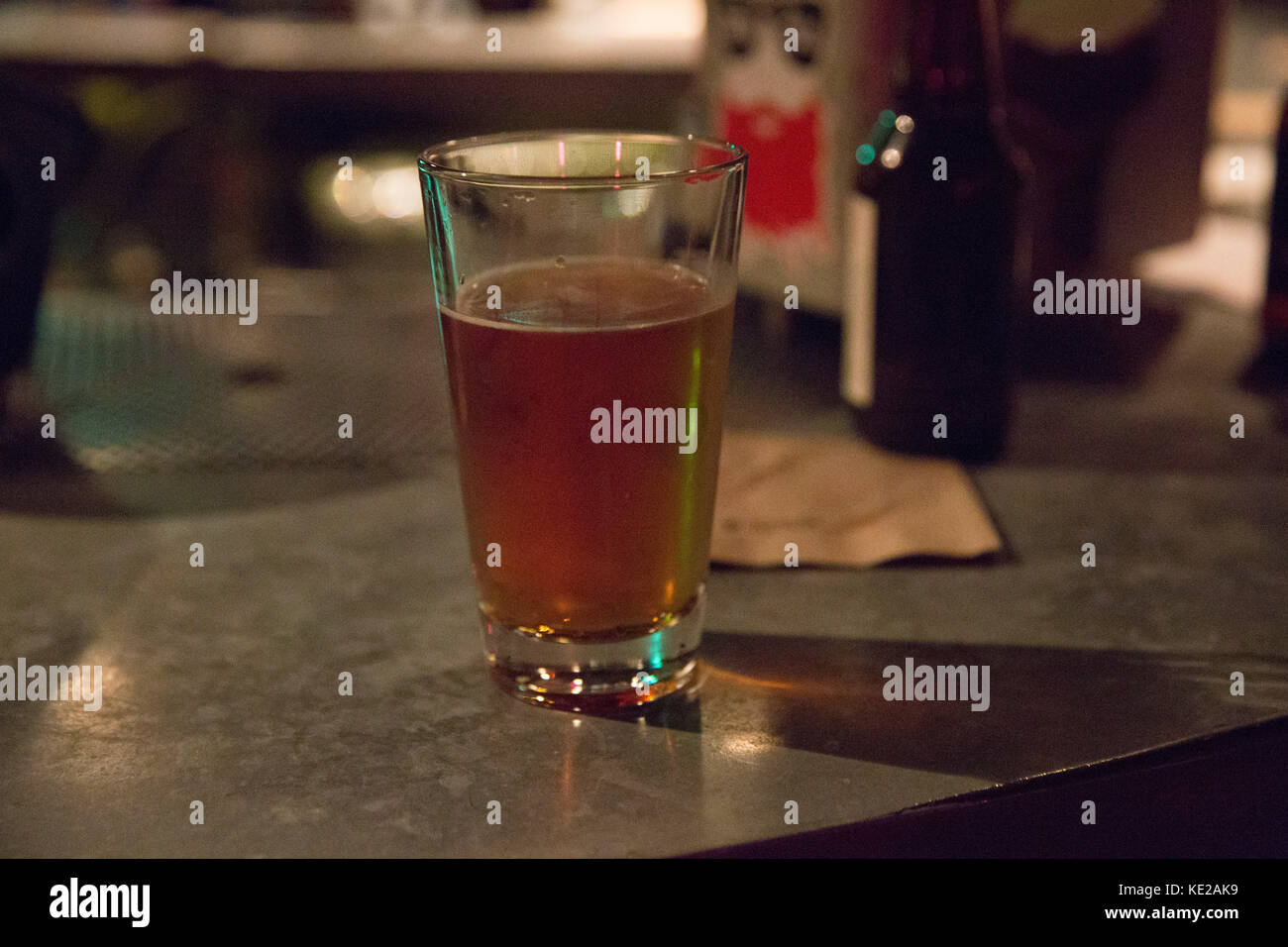 Pint of lager on bar in Manhattan, NY Stock Photo - Alamy