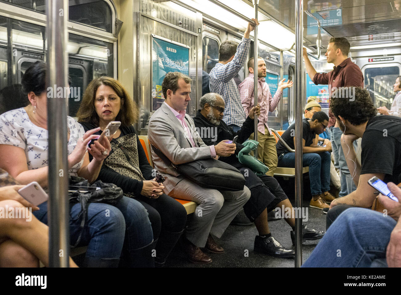 View of passengers inside subway train in Manhattan, New York City ...