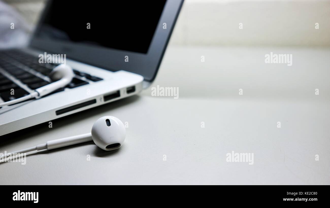 laptop and headsets Stock Photo - Alamy
