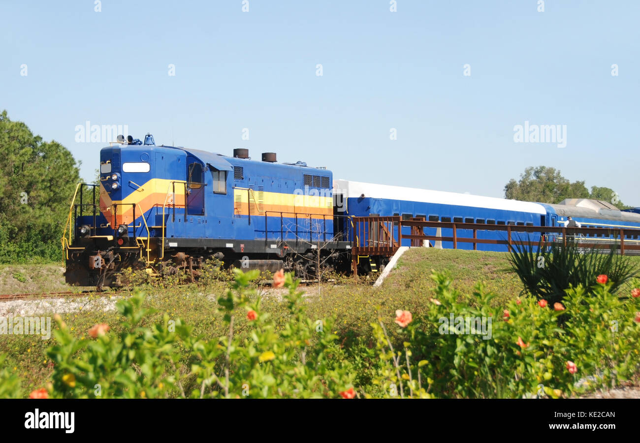 Blue colored diesel passenger train Stock Photo - Alamy
