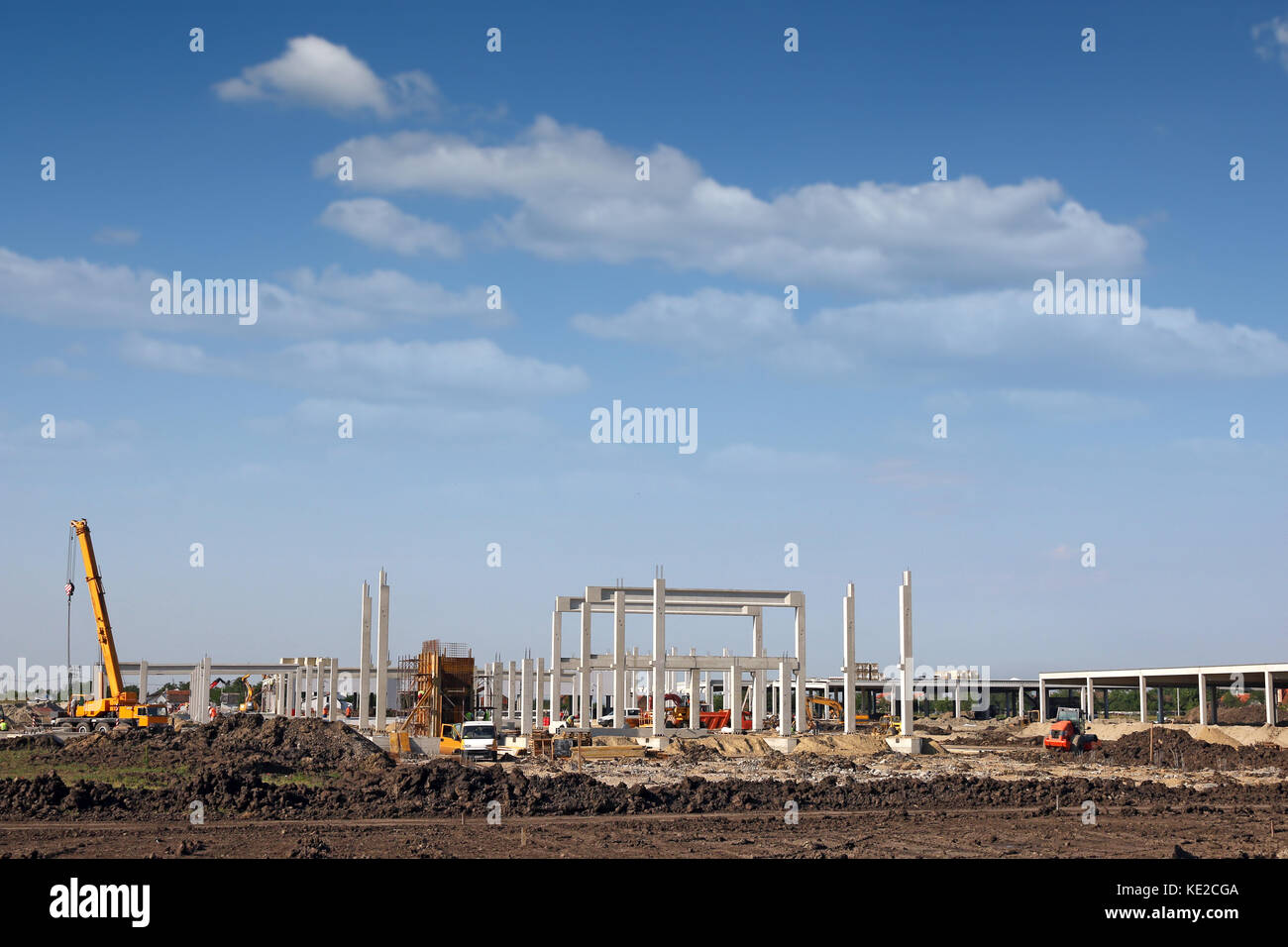 shopping mall construction site with workers and machinery Stock Photo ...