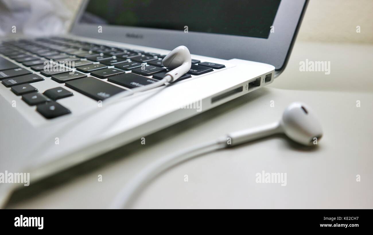 laptop and headsets Stock Photo - Alamy