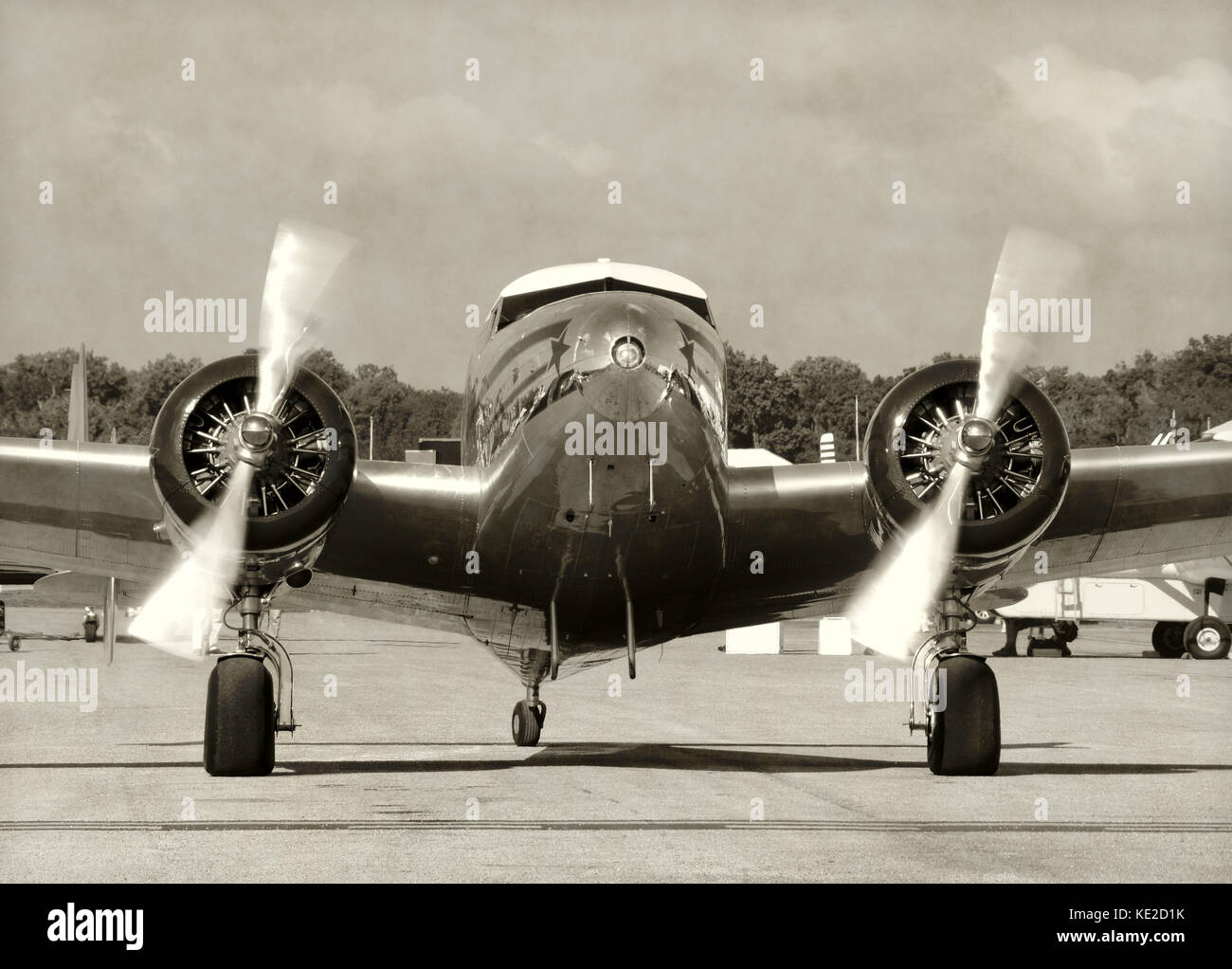 Front view vintage propeller airplane running engines Stock Photo - Alamy