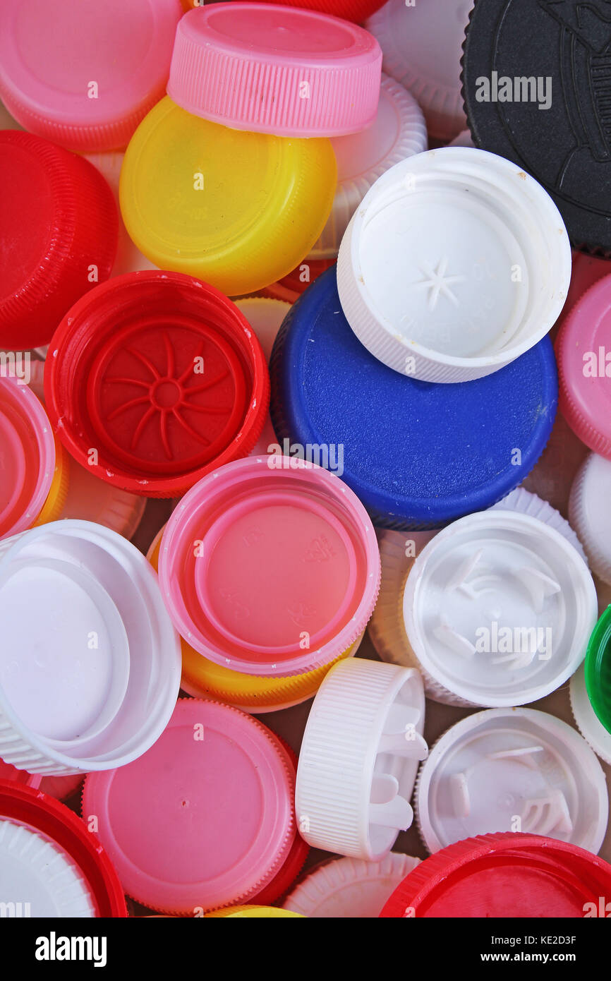 Plastic bottle caps. Close-up shot of stack of recyclable plastic ...