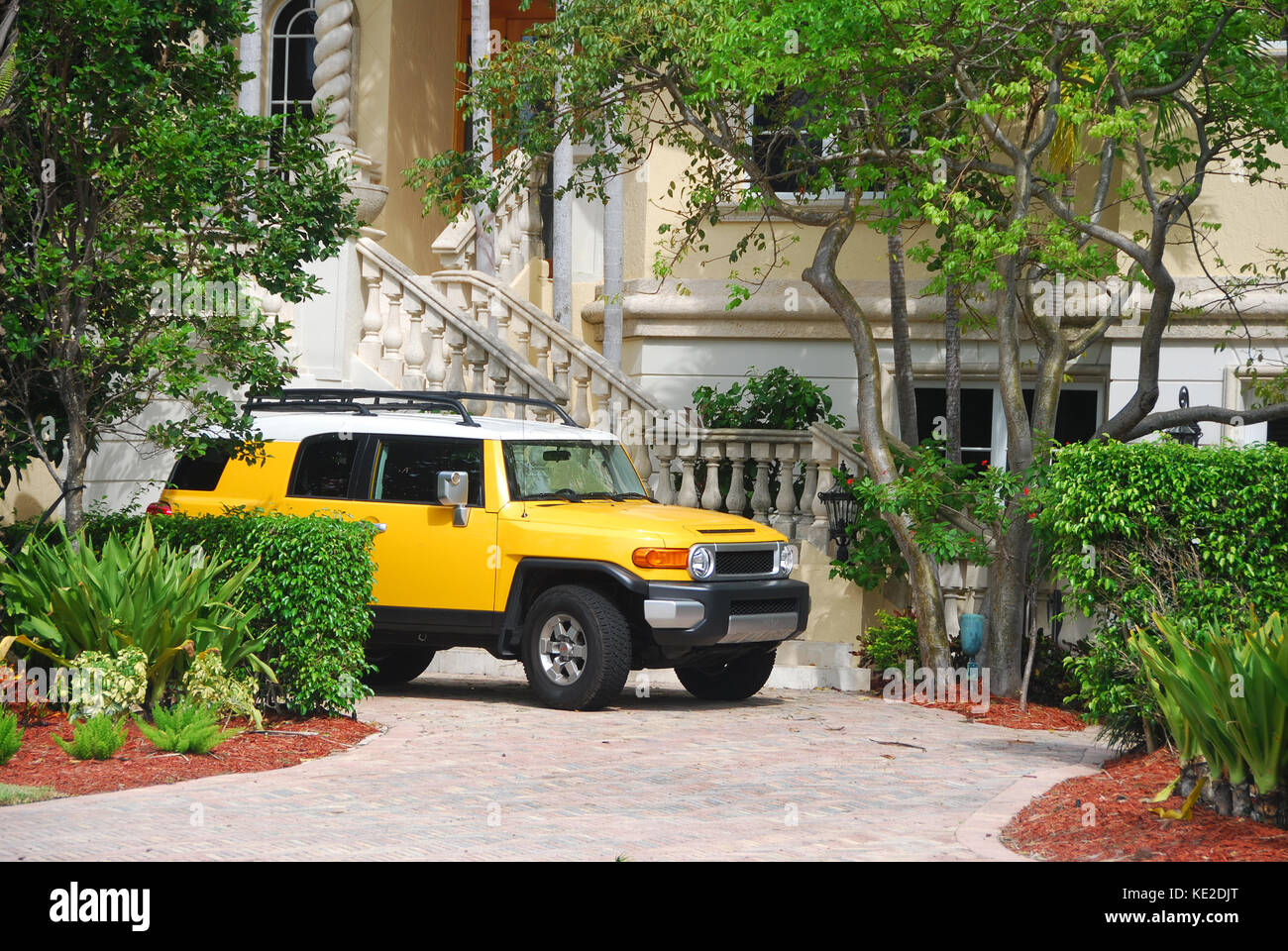 SUV in driveway Stock Photo - Alamy