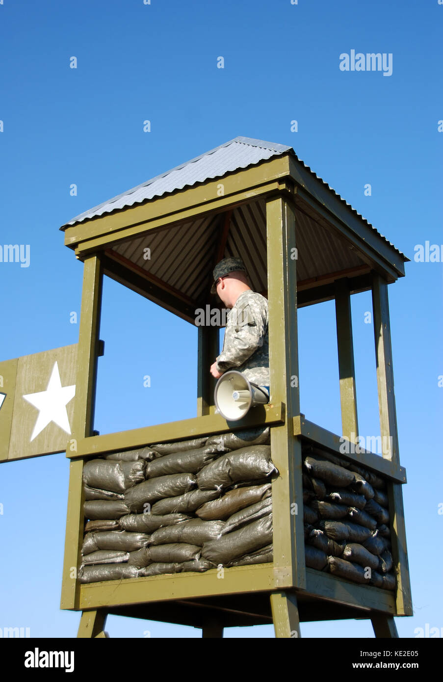 Guard on watchtower Stock Photo - Alamy