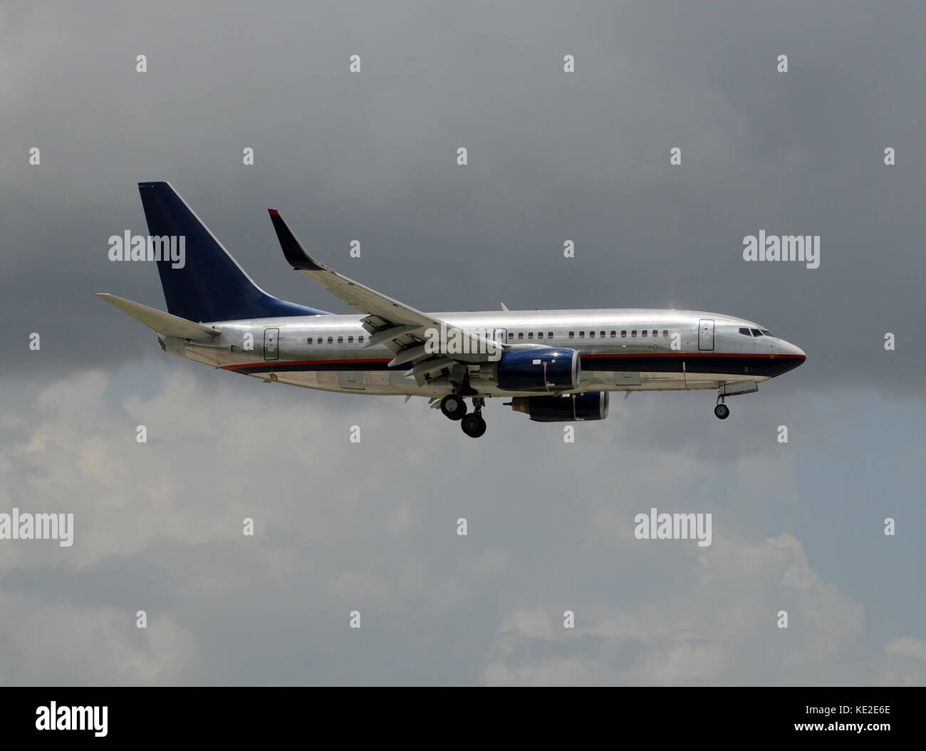 Modern passenger jet airplane in flight Stock Photo - Alamy