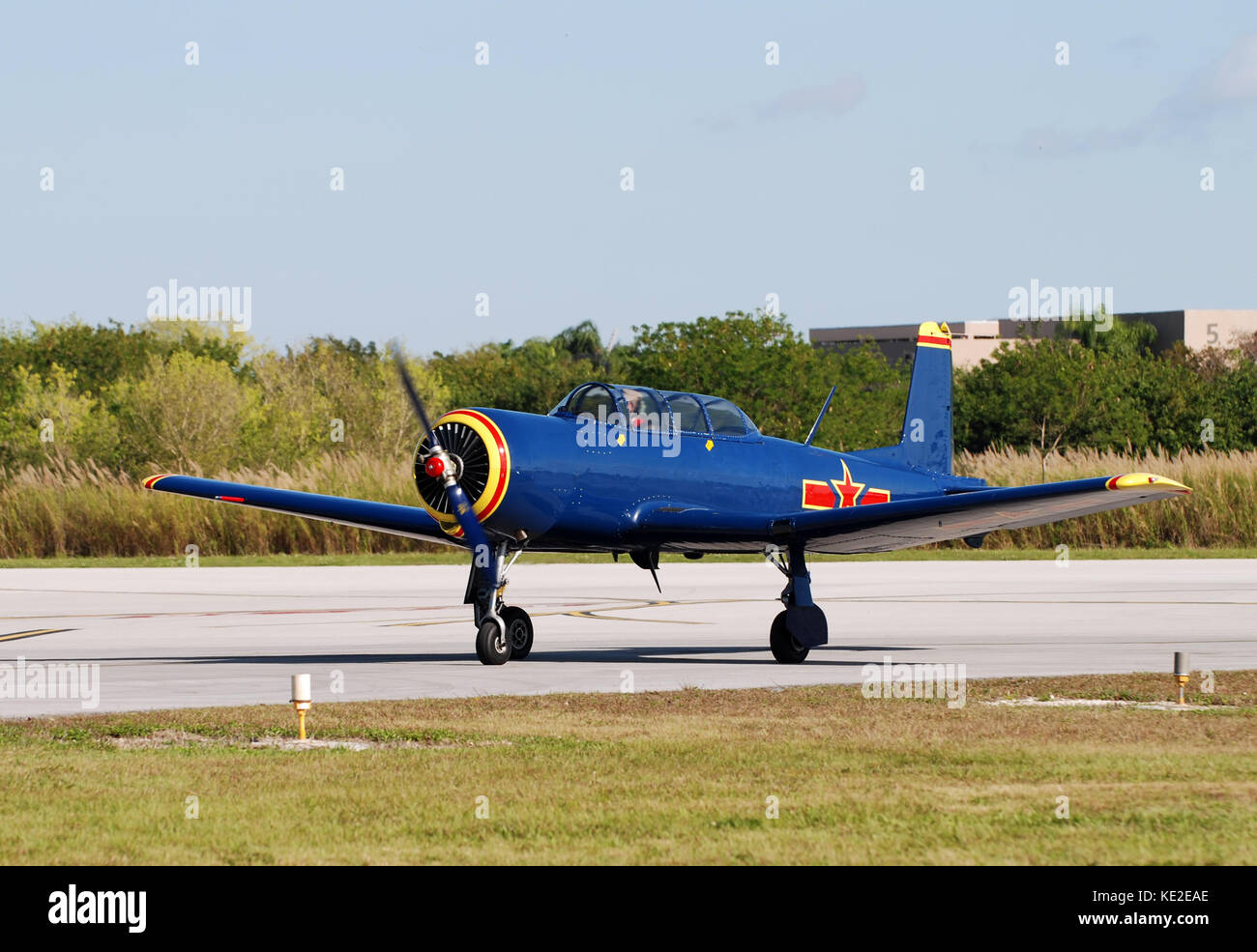Light private propeller airplane in blue color Stock Photo - Alamy