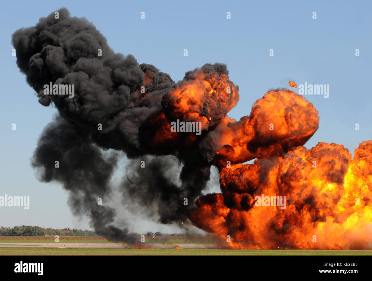 Giant outdoor explosion with fire and black smoke Stock Photo - Alamy