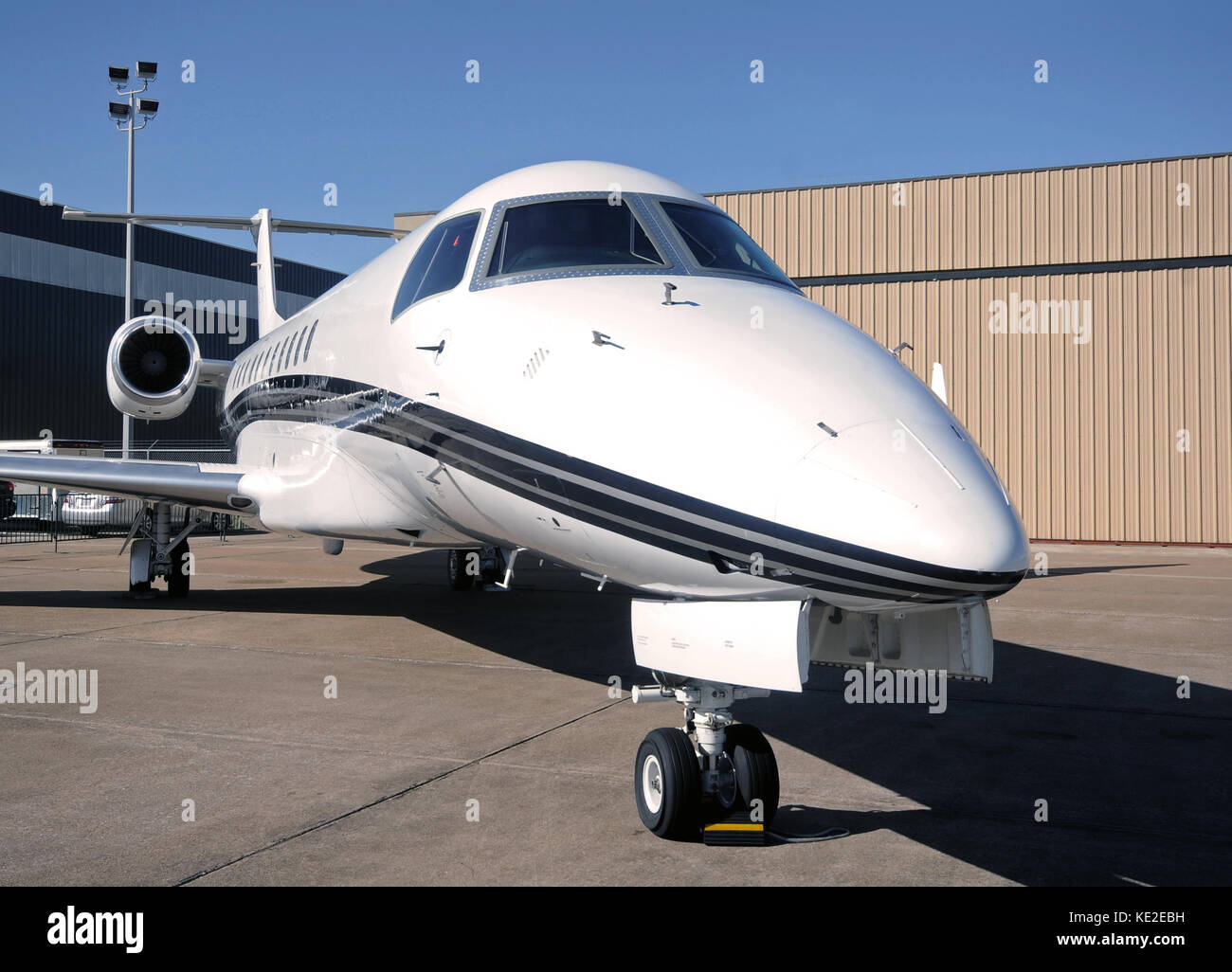Luxury private jet on the ground front view Stock Photo - Alamy