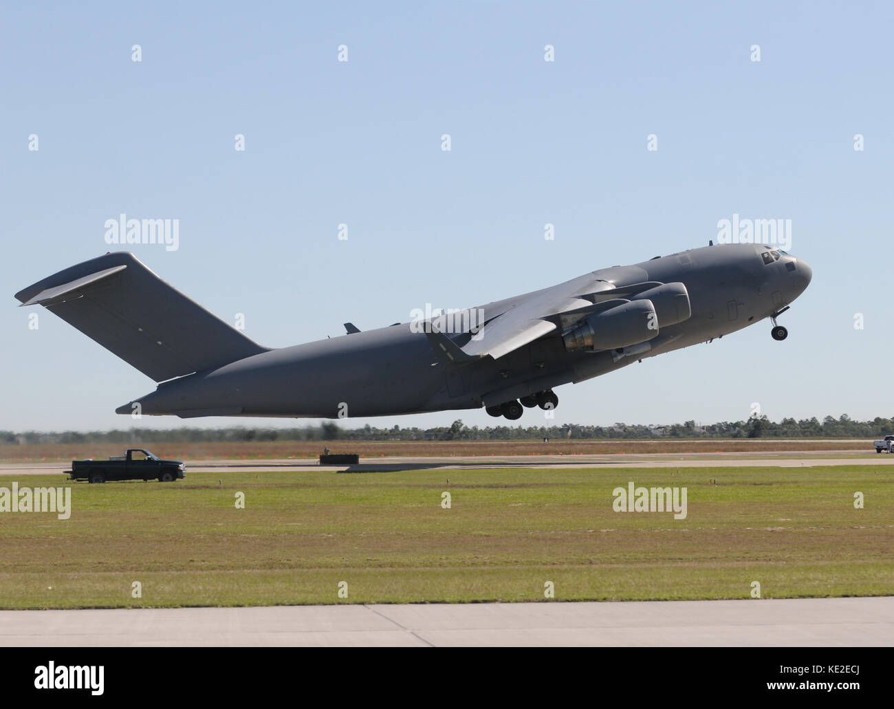 US Air Force military cargo airplane taking off Stock Photo - Alamy