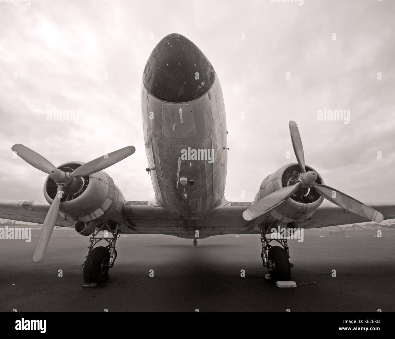 Vintage propeller airplane on the ground front view Stock Photo - Alamy