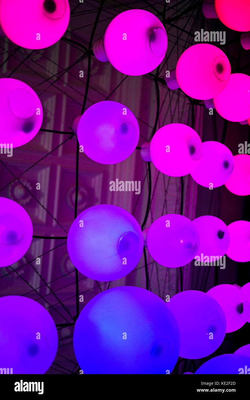 colourful round pink lights in funky modern interior design detail ...