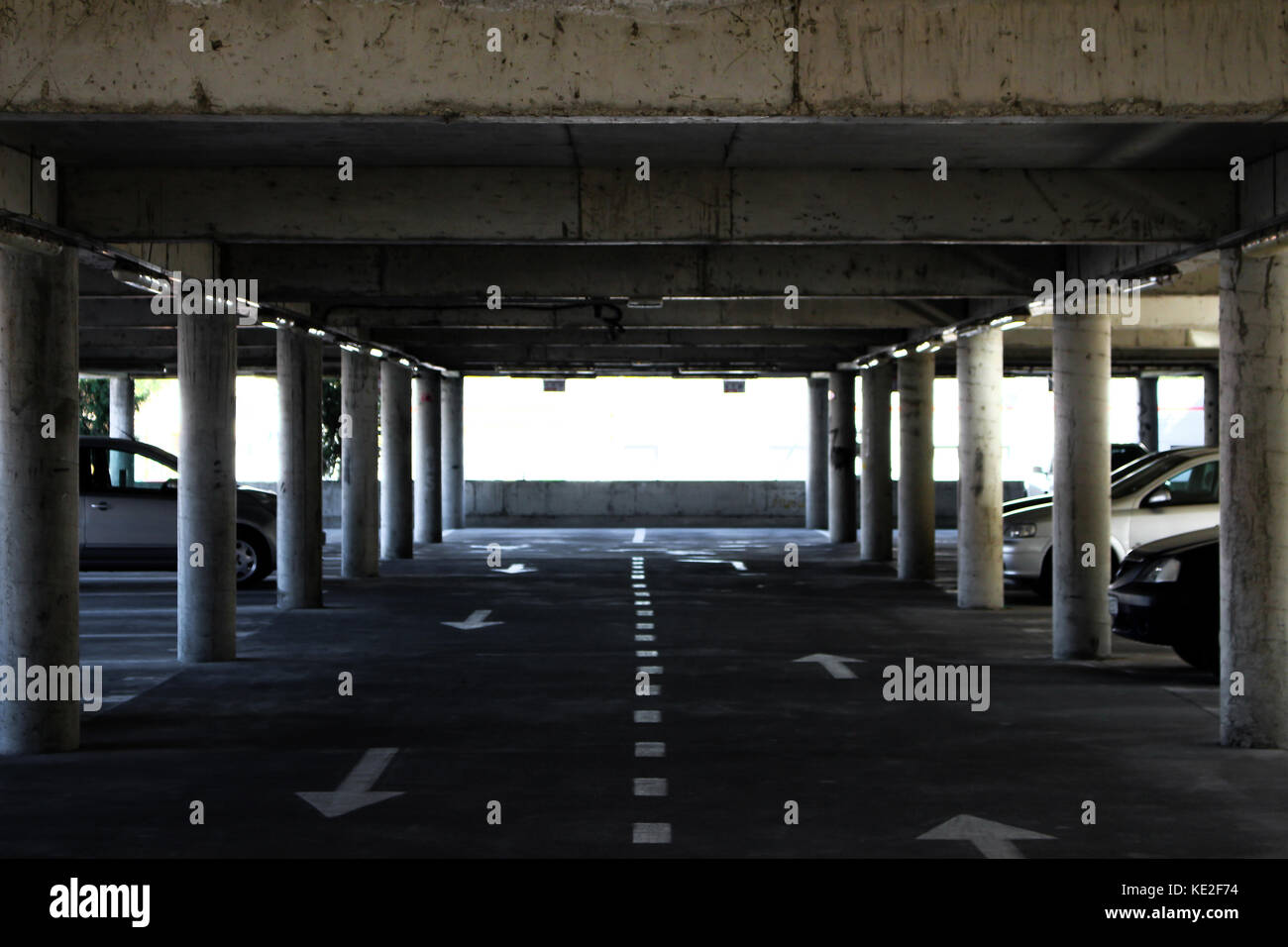 Parking lot in basement of a mall Stock Photo - Alamy