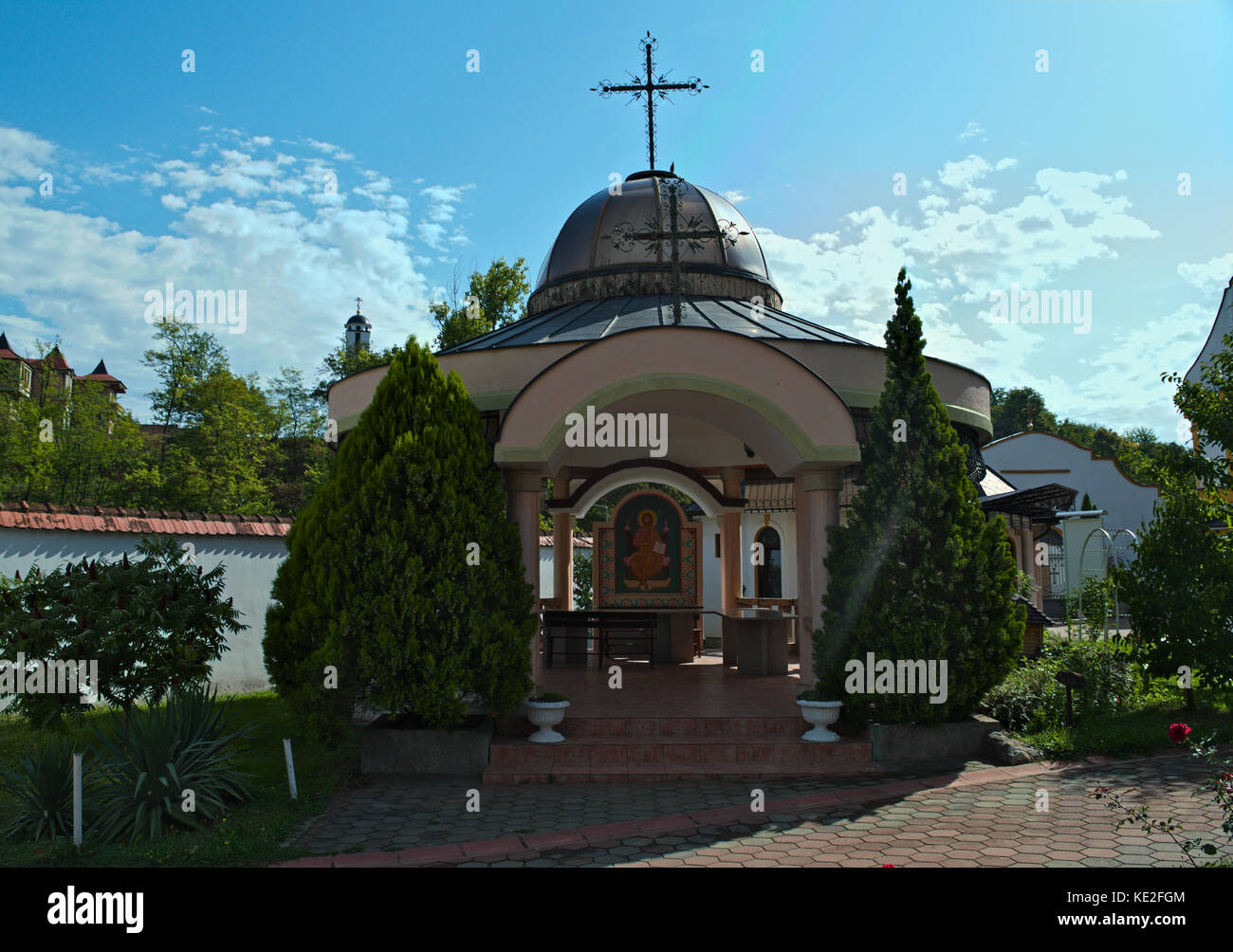 Small open chapel and decorative plants around it Stock Photo - Alamy