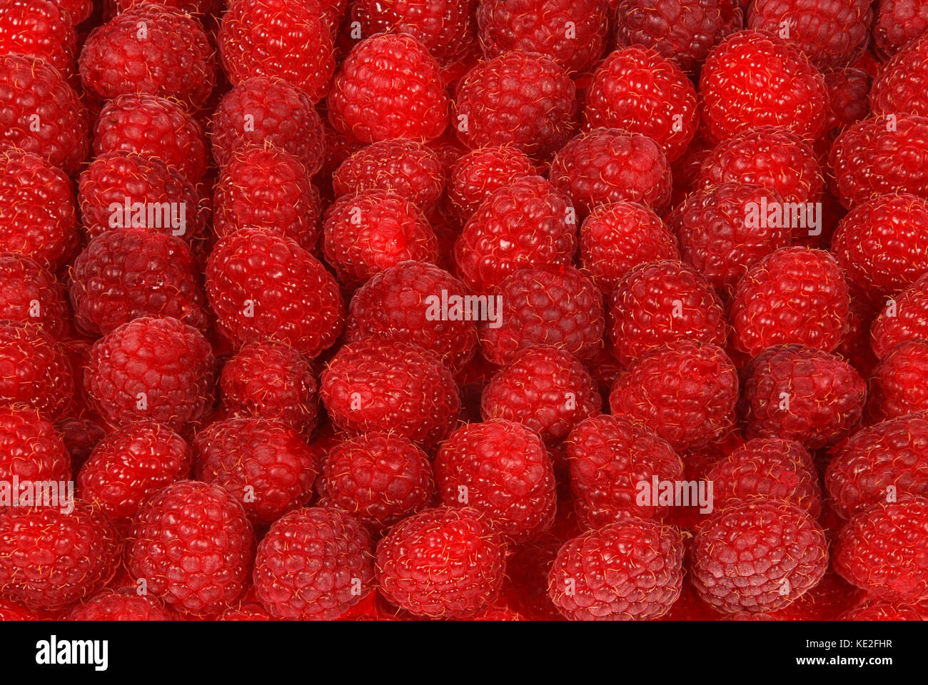 Ripe raspberry background Stock Photo - Alamy