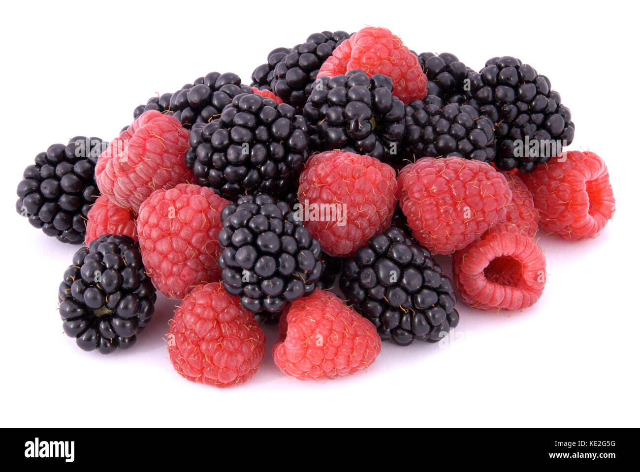 Raspberries and blackberries on white background Stock Photo - Alamy