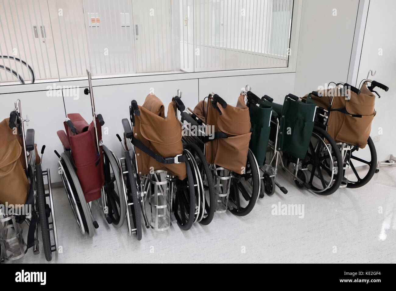 Rows of hospital wheelchair prepare for patient or disabled parked in ...