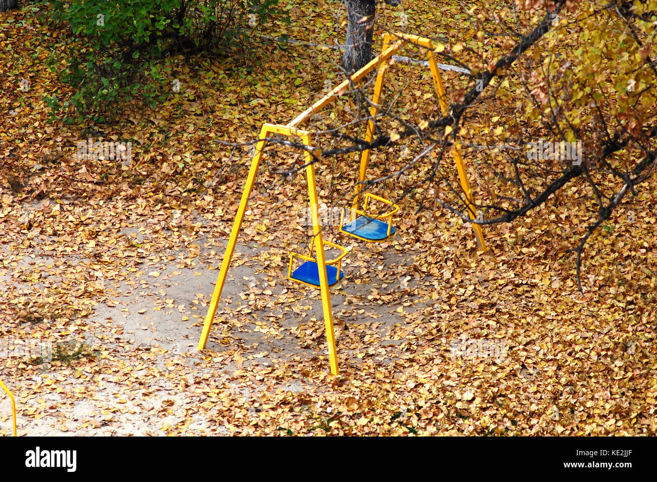 Children's swing at yard autumn playground. Top view. Autumn mood Stock ...