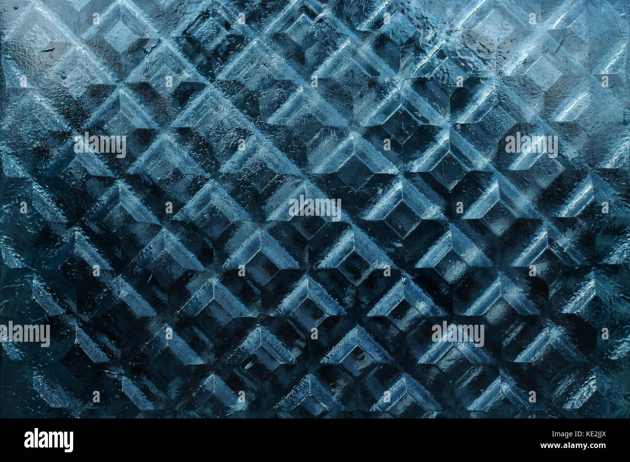 Dense thick window glass texture with rhombus pattern close-up Stock ...