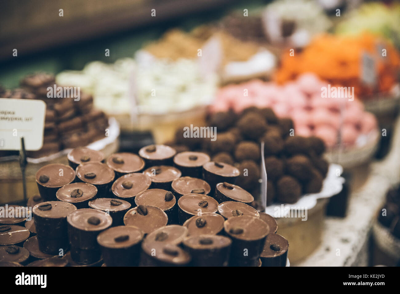 store counter with chocolate candies close up Stock Photo - Alamy