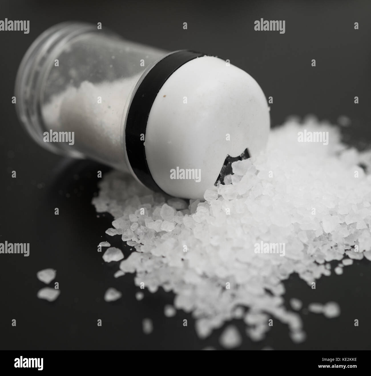 salt shaker on a black background Stock Photo - Alamy