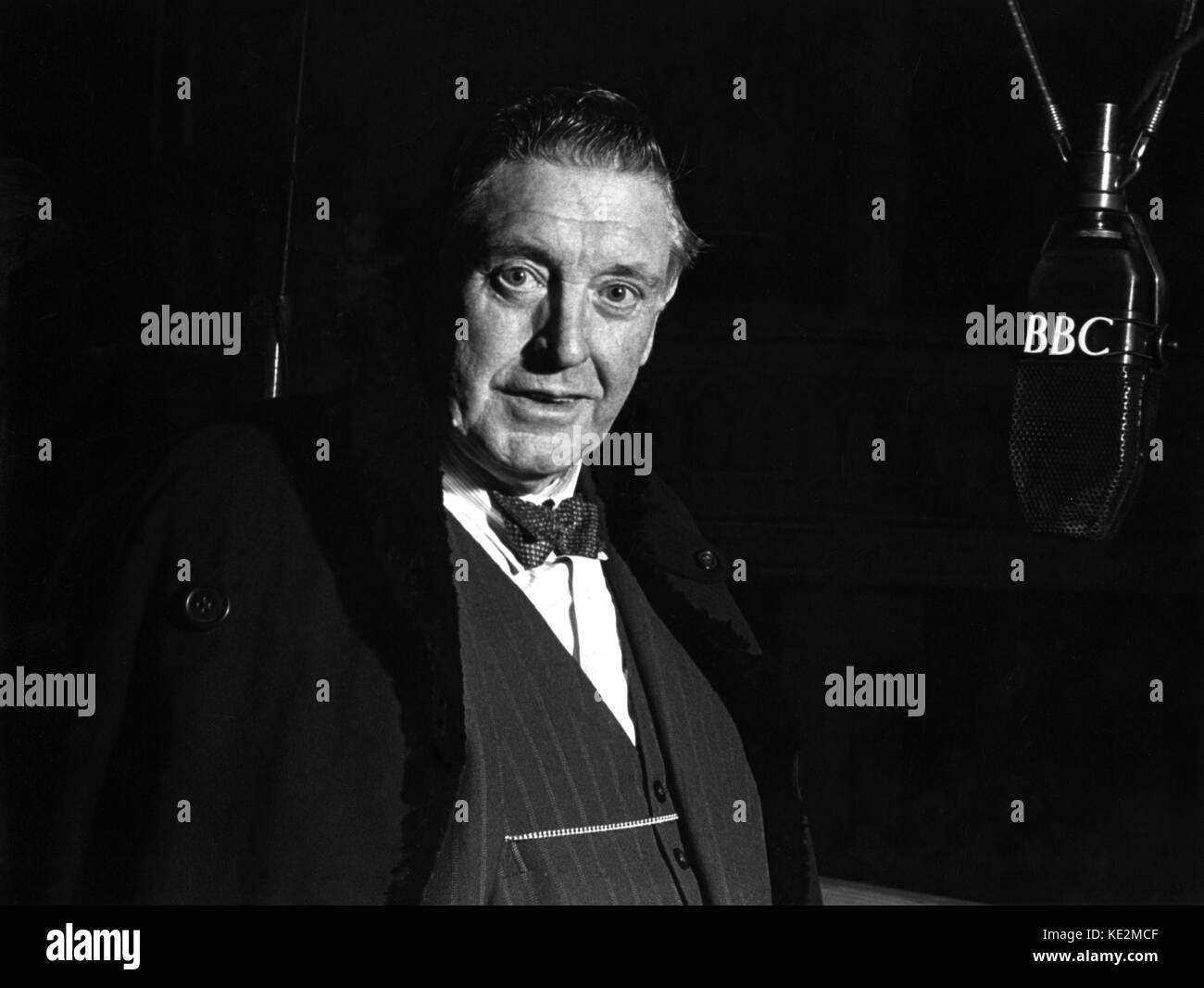 John McCormack stnading in fornt of a BBC microphone. Irish tenor. 14 ...