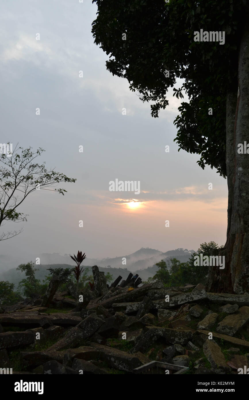 Sunrise at the megalithic site in West Java, Indonesia. It has ...