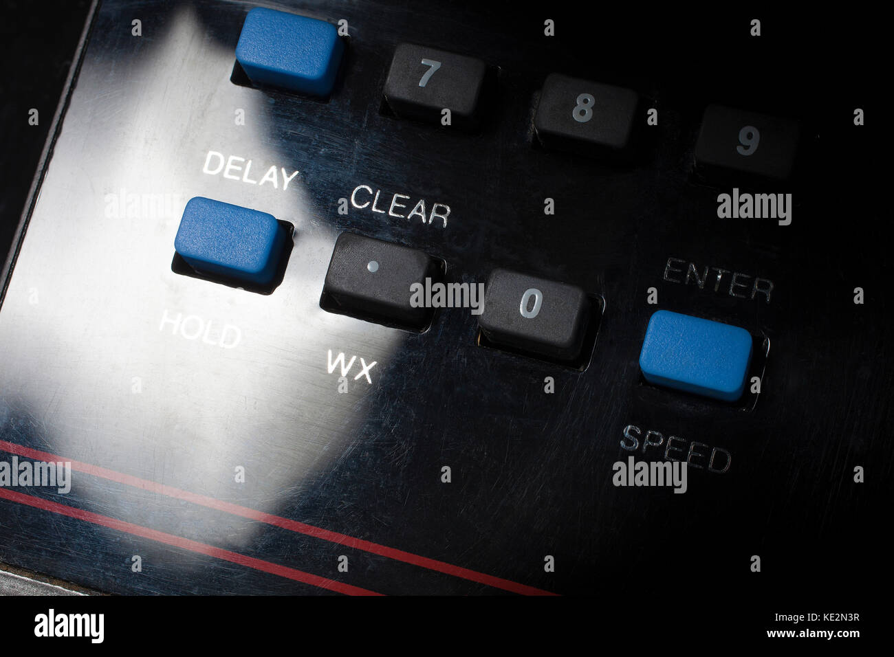 Buttons on an old radio with one for weather alerts Stock Photo - Alamy