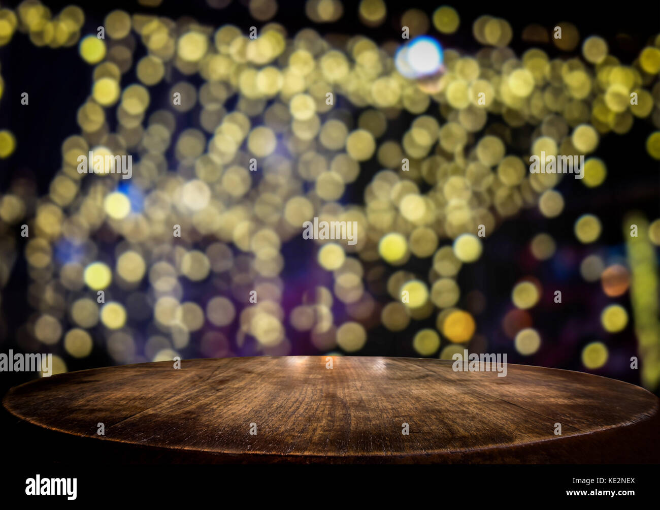 wooden table top on blur night light bokeh background for display ...