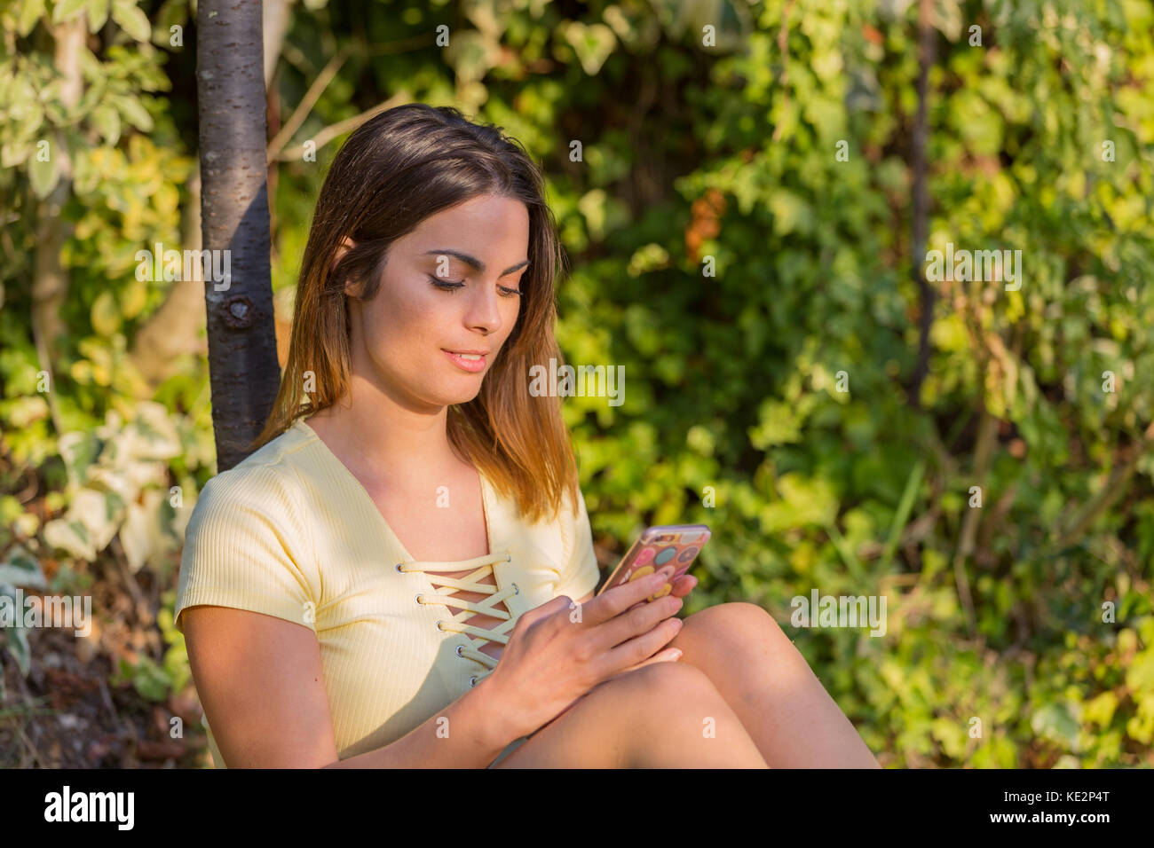 young beautiful woman on the phone, outdoor Stock Photo - Alamy