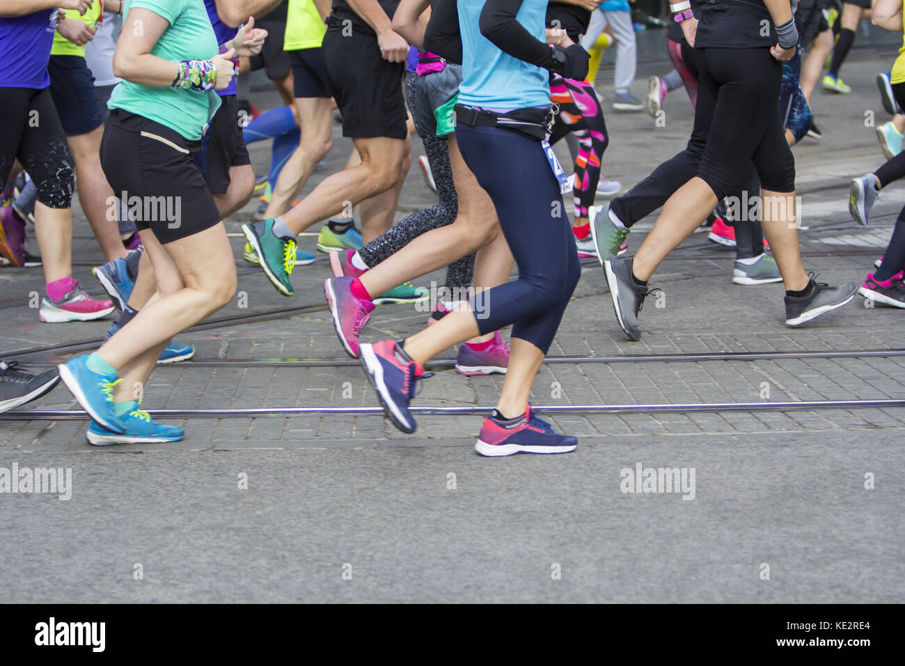 Marathon running race on the city road Stock Photo - Alamy