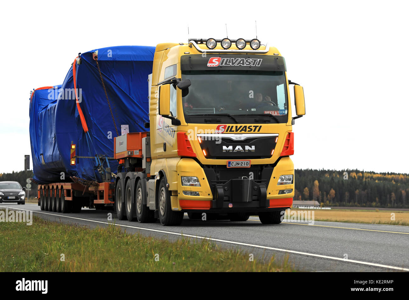 JOKIOINEN, FINLAND - OCTOBER 13, 2017: Yellow Yellow MAN TGX 41.640 ...