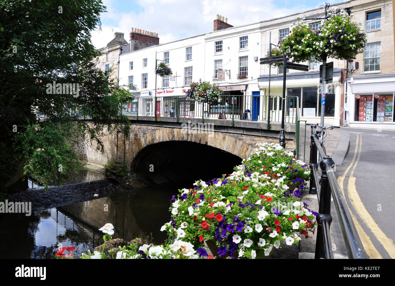 Bridge over the river Frome in town centre with shops,cafe and offices ...