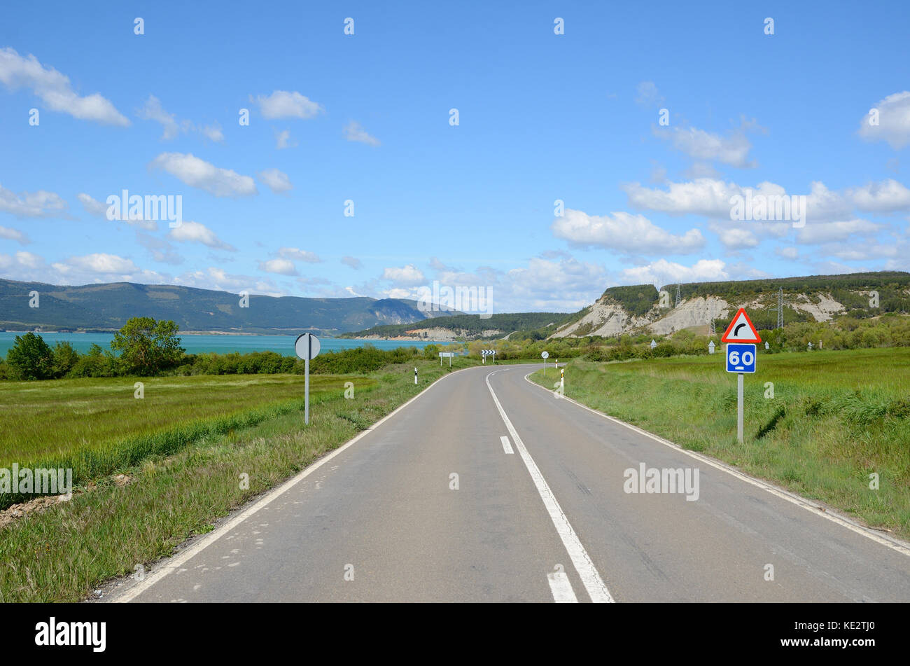 Spring view of the blue lake Yesa Stock Photo - Alamy