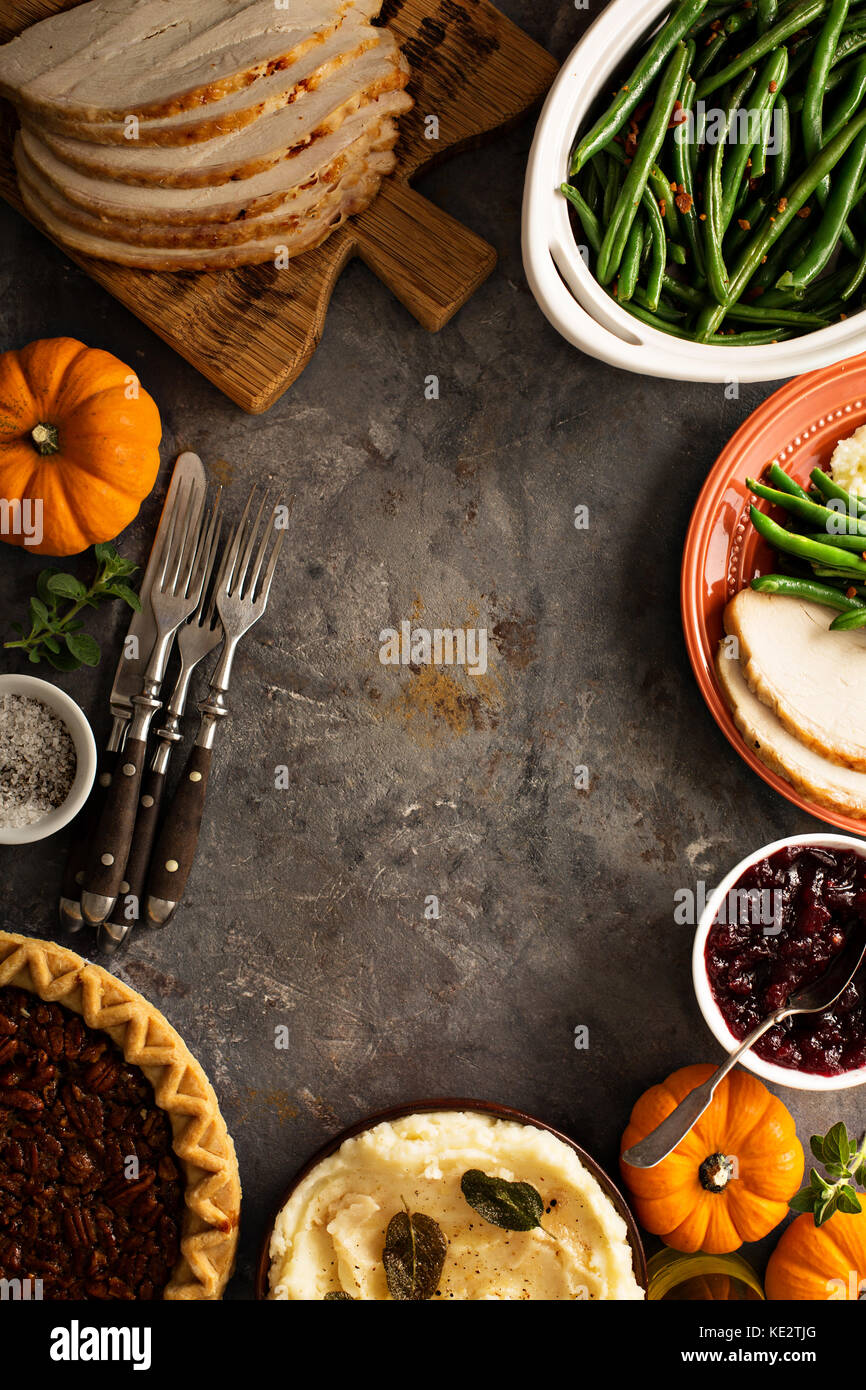 Thanksgiving table with turkey, green beans and mashed potatoes ...