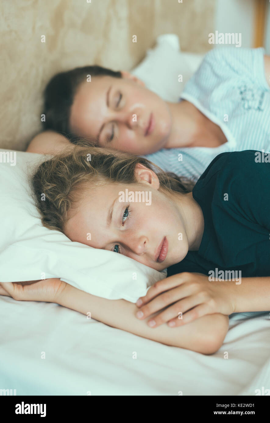 Little girl has insomnia, cant sleep Stock Photo - Alamy
