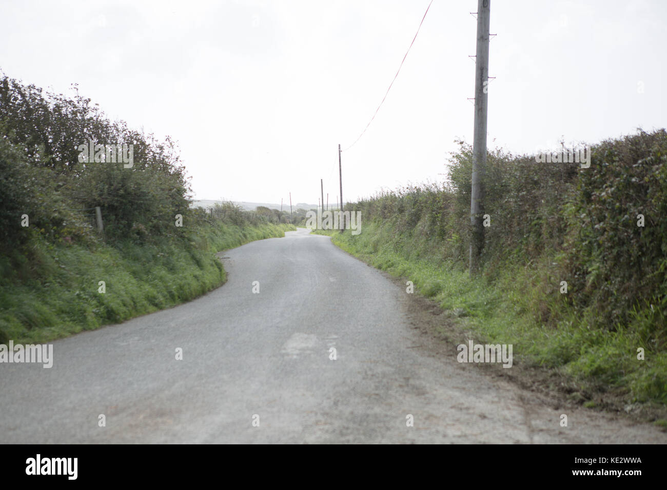Empty British country road Stock Photo - Alamy