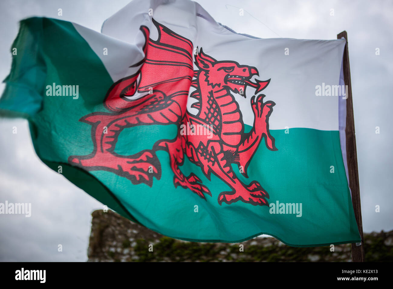 Welsh flag blowing in Wind Stock Photo - Alamy