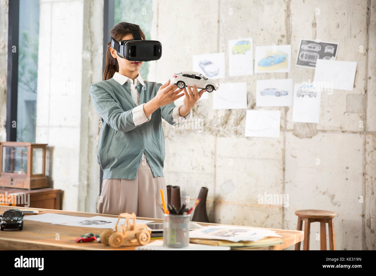 Female model holding virtual hi-res stock photography and images - Alamy